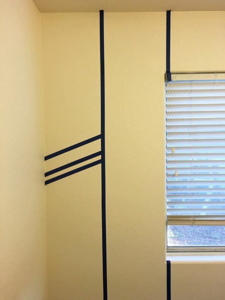 How to Create a Herringbone Accent Wall with Paint - Enthralling Gumption